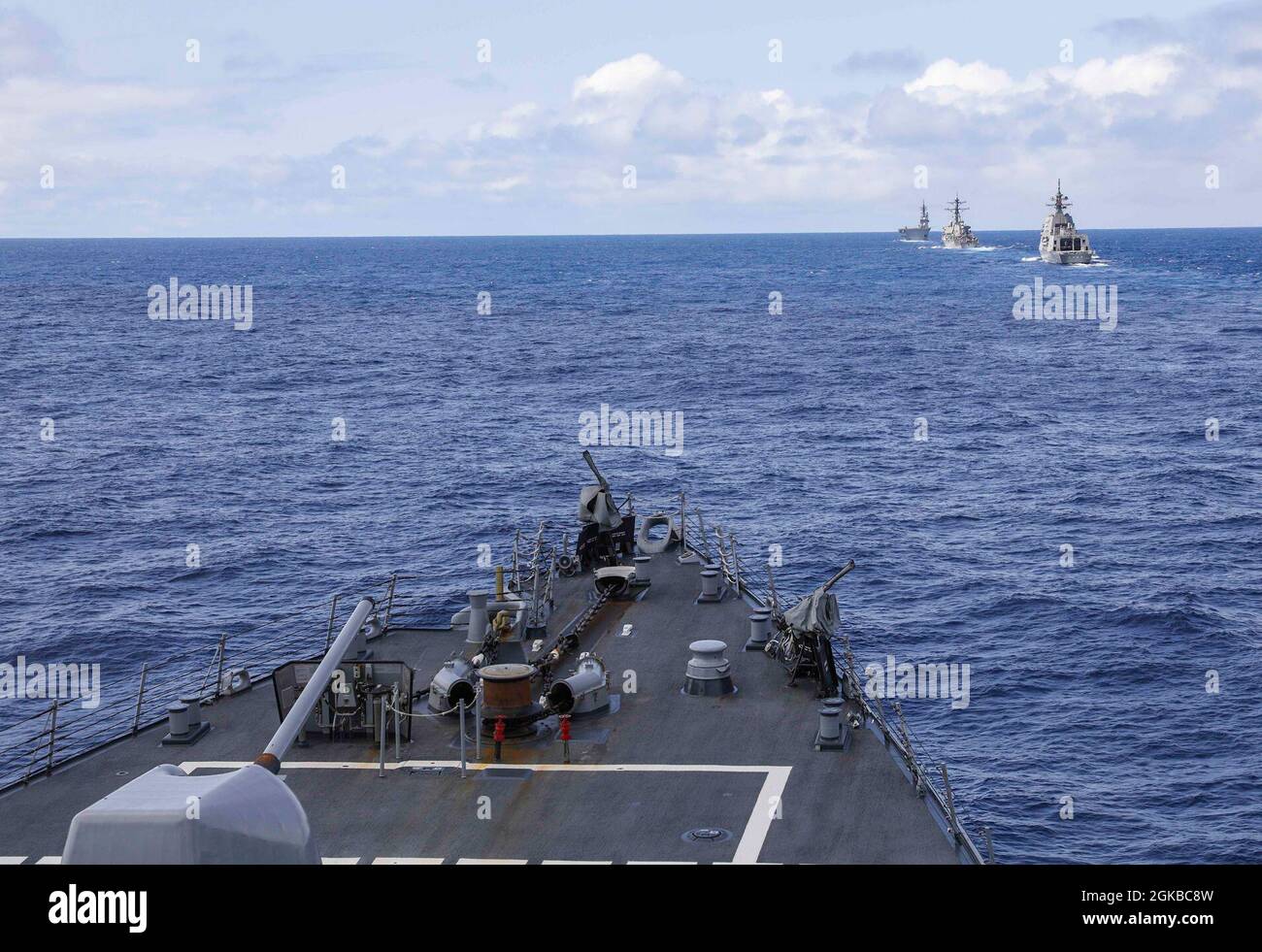 The Arleigh Burke-class guided-missile destroyers USS Benfold (DDG 65 ...