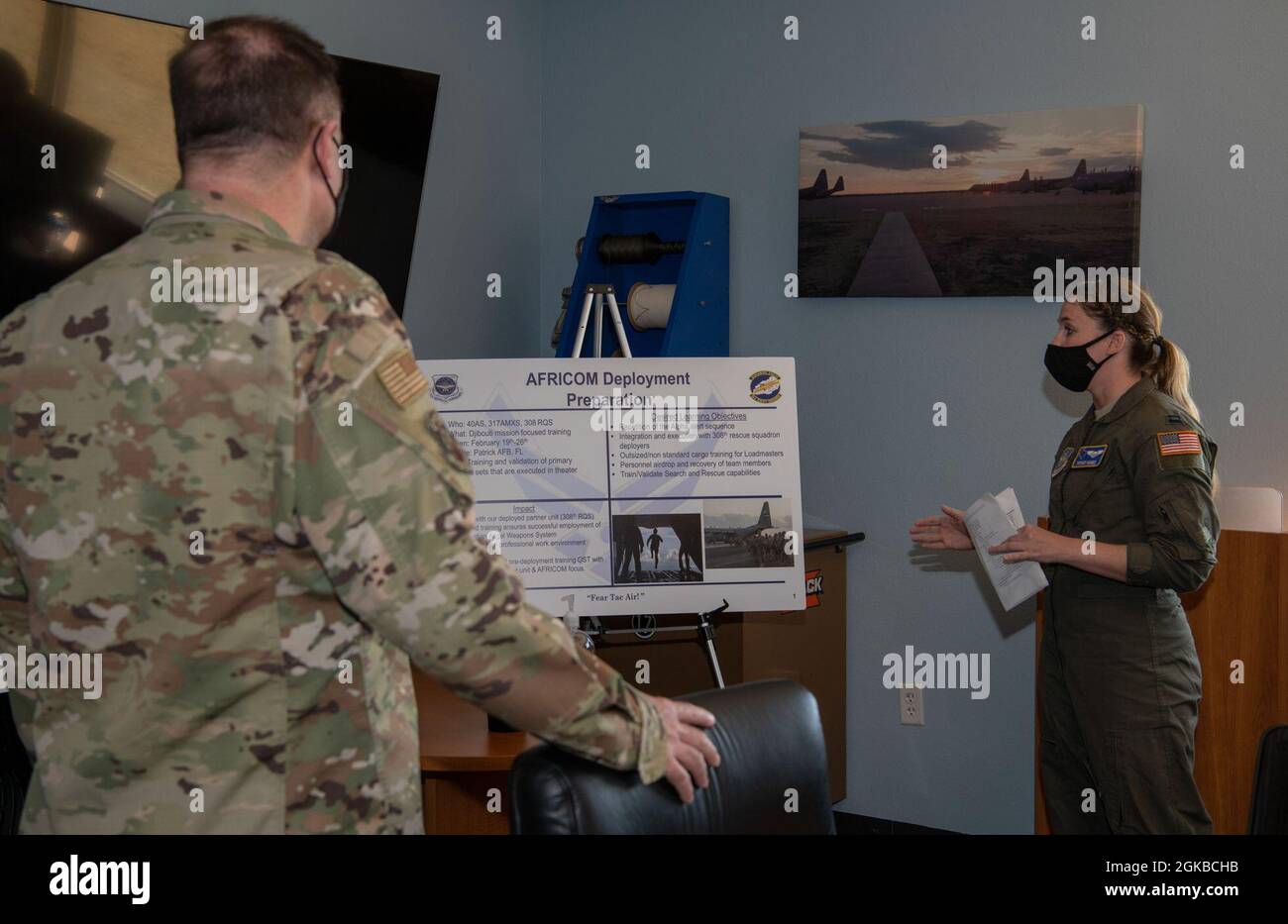 Capt. Tiffany Haines, 40th Airlift Squadron aircraft commander, briefs ...