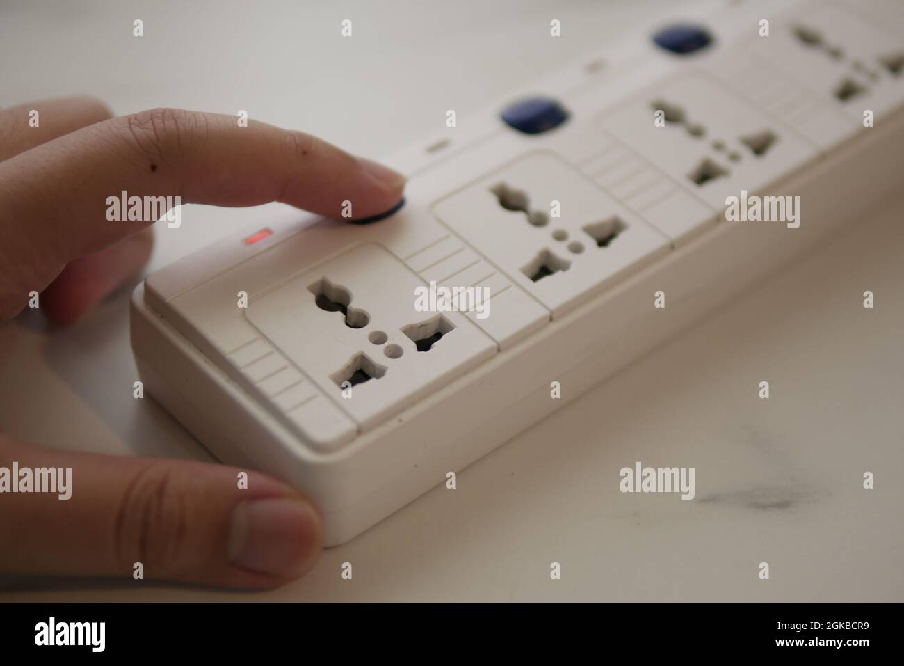 Turning on a plug socket hi-res stock photography and images - Alamy