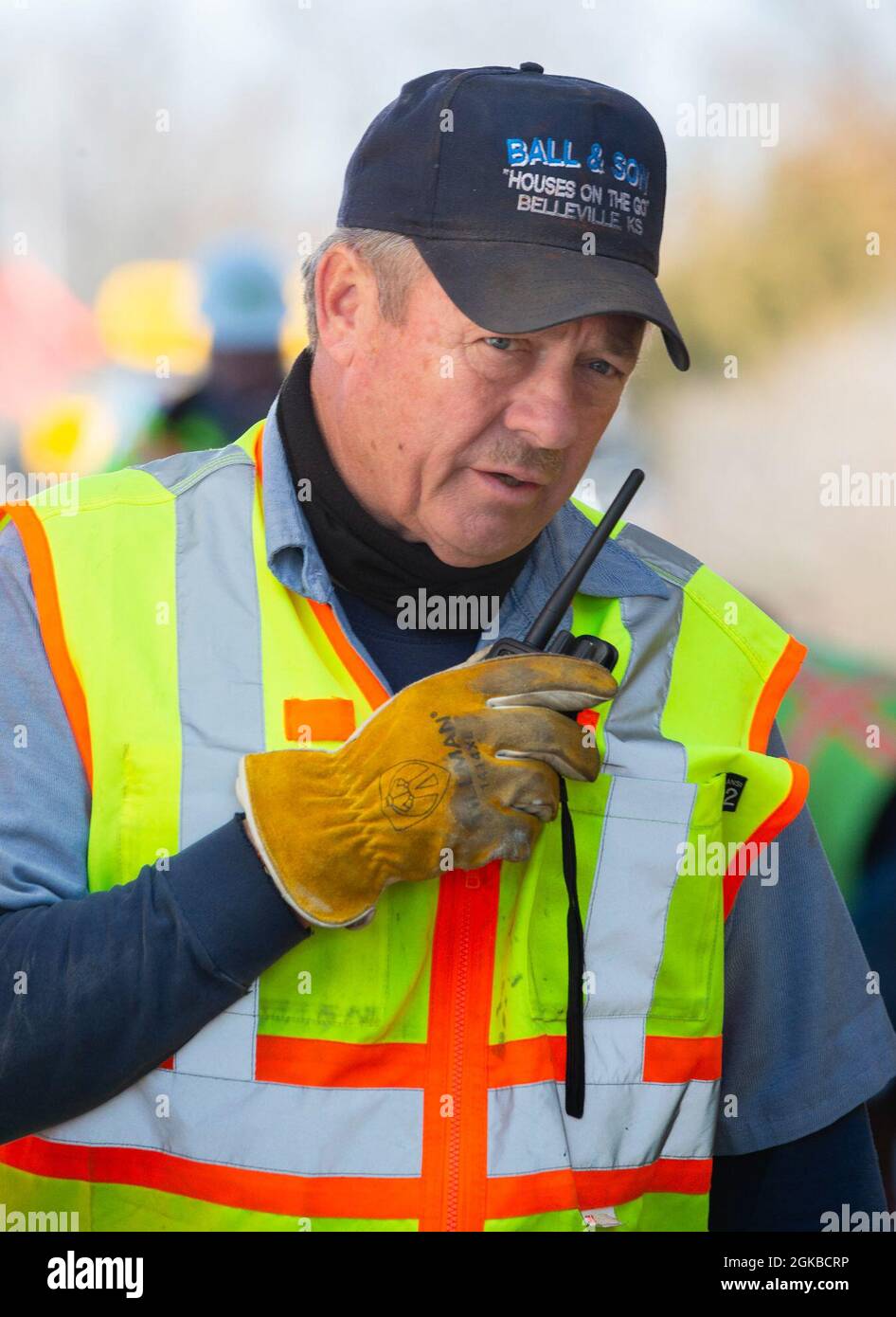 Leon Ball, Ball and Son Movers, uses a radio to communicate with the ...