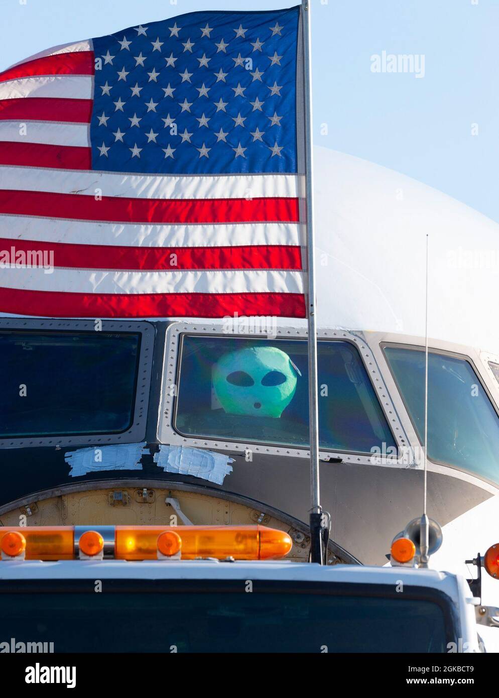 A stuffed space alien rides in the cockpit of a Boeing 767 on March 3 ...