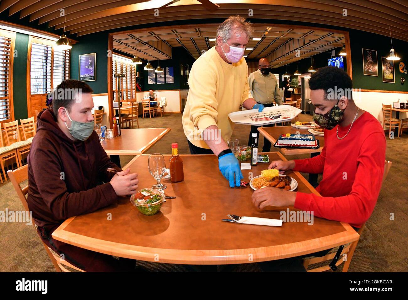Airman 1st Class Dawson Sigetti (left) and Airman 1st Class John Moore ...