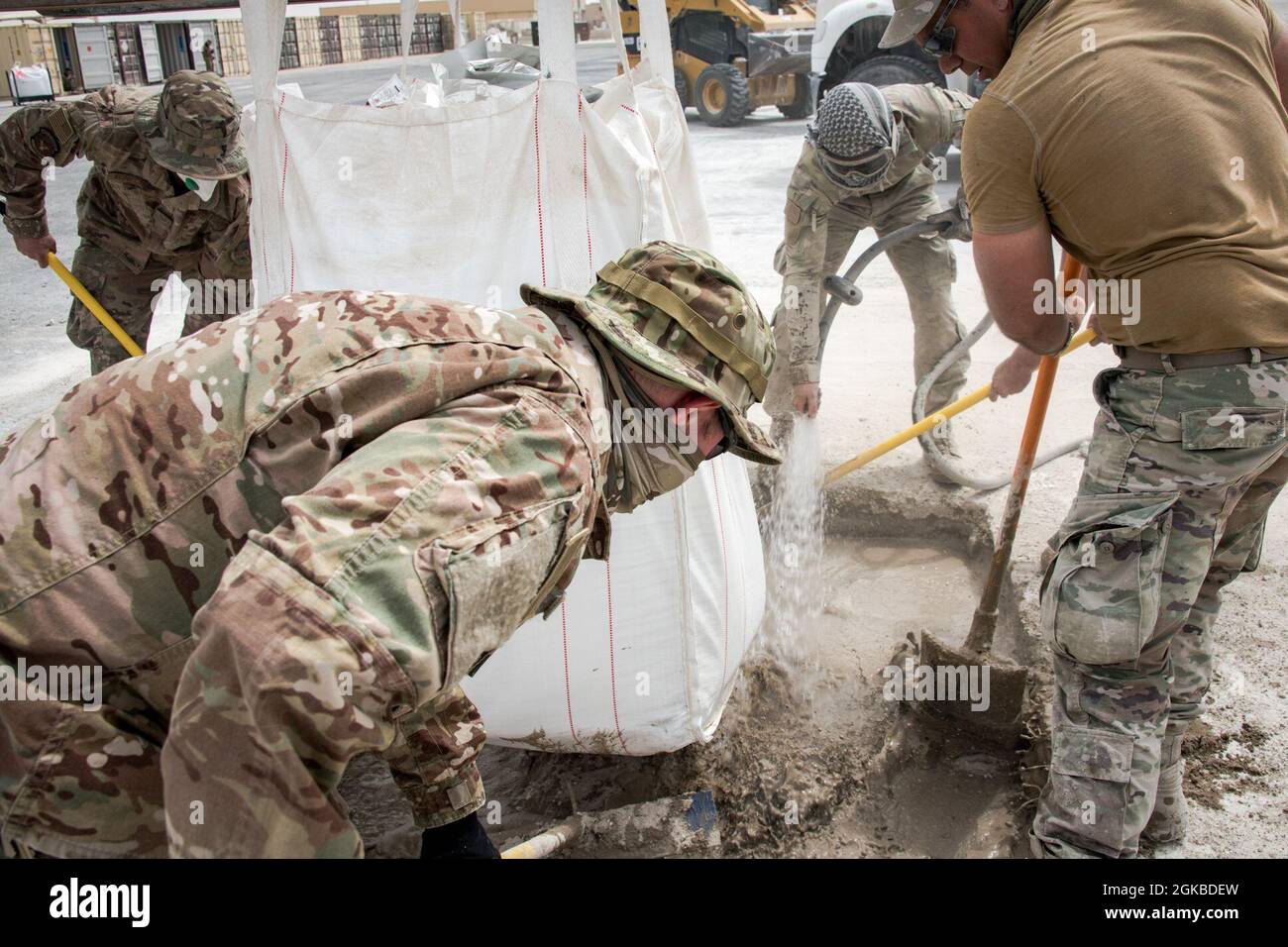 U.S. Airmen assigned to the 379th Expeditionary Civil Engineer Squadron ...