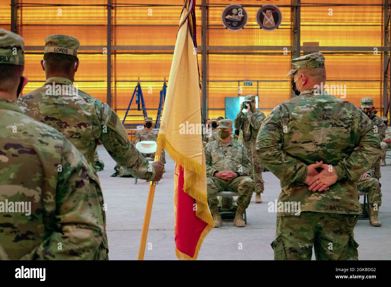 Col. Mark Coble, 734th Regional Support Group commander, sits in front ...