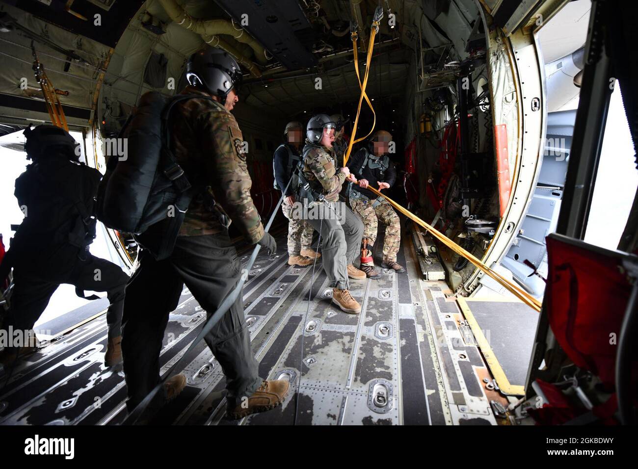 U.S. Special Operations Forces retrieve the universal static line after ...