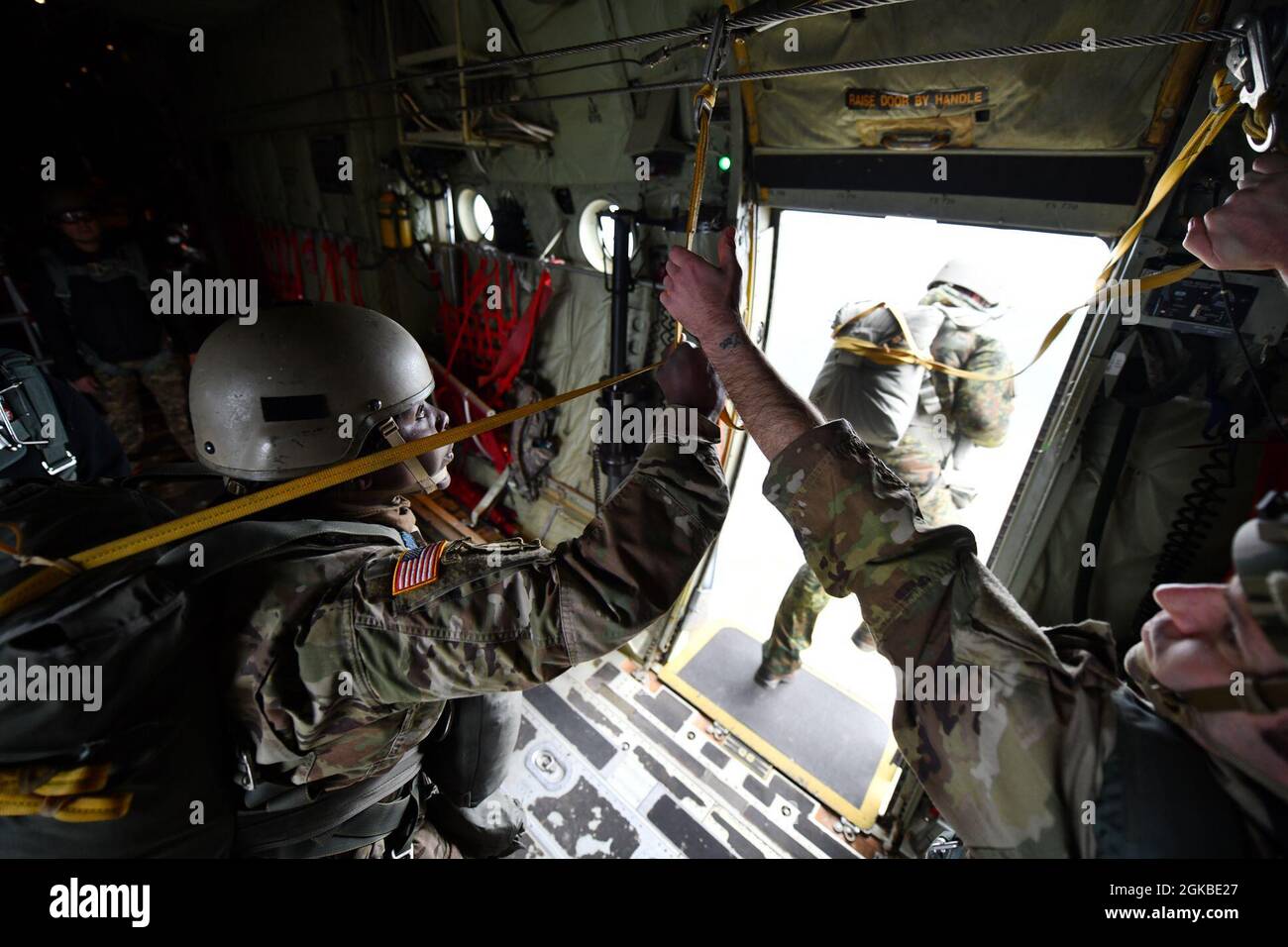 U.S. Special Operations Forces exit out of a C-130J Super Hercules ...