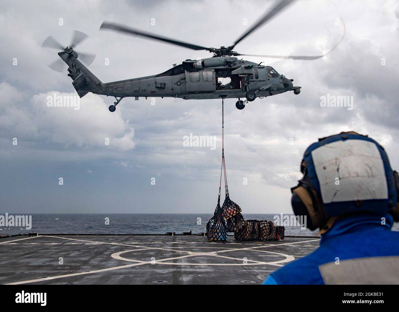 210303-N-NQ285-1064 ATLANTIC OCEAN (March 3, 2021) An MH-60S Knight ...