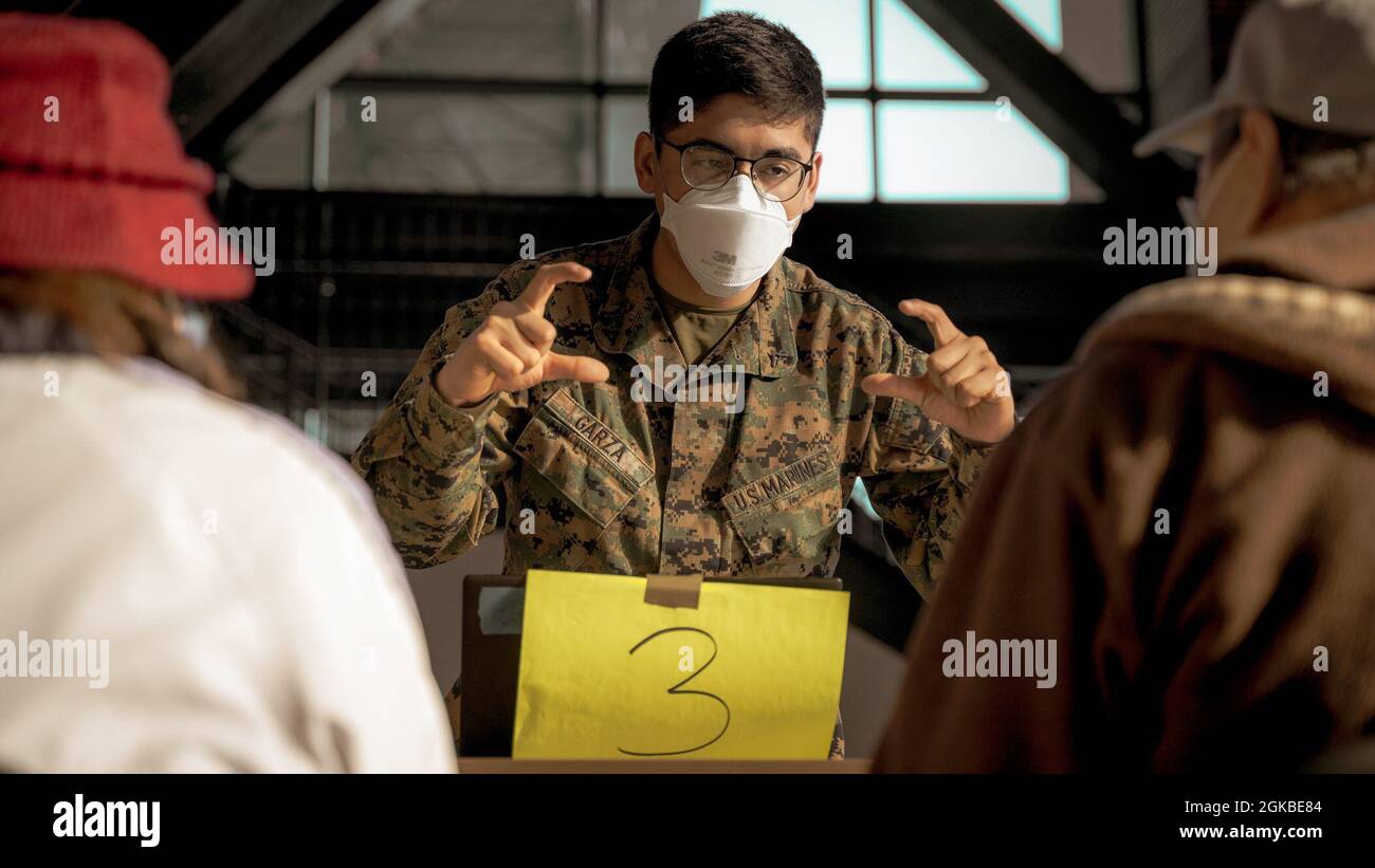 U.S. Marine Corps Lance Cpl. Michael Garza, with 1st Marine Logistics ...