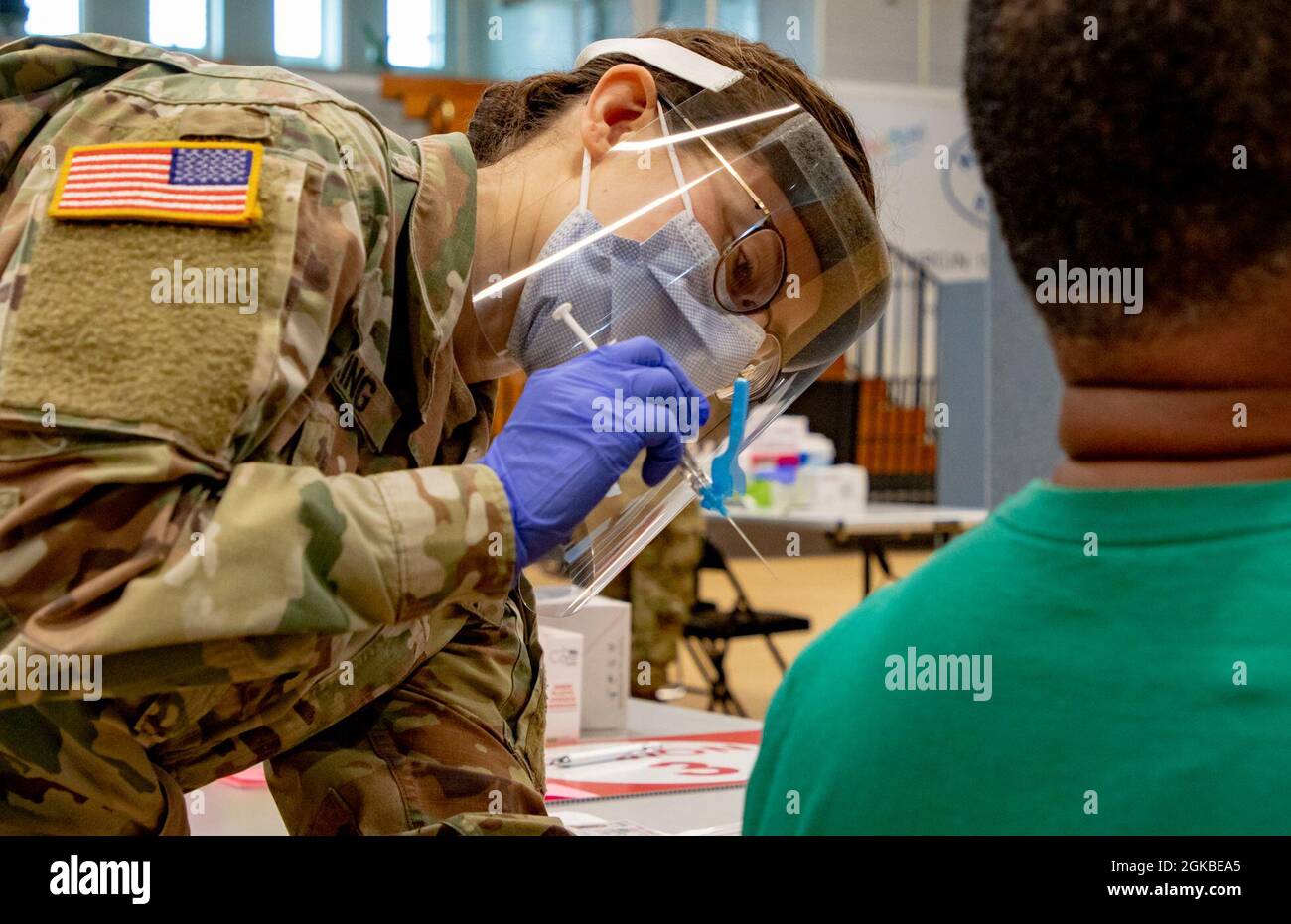 U.S. Army Spc. Audrey Selking, a practical nursing specialist assigned ...