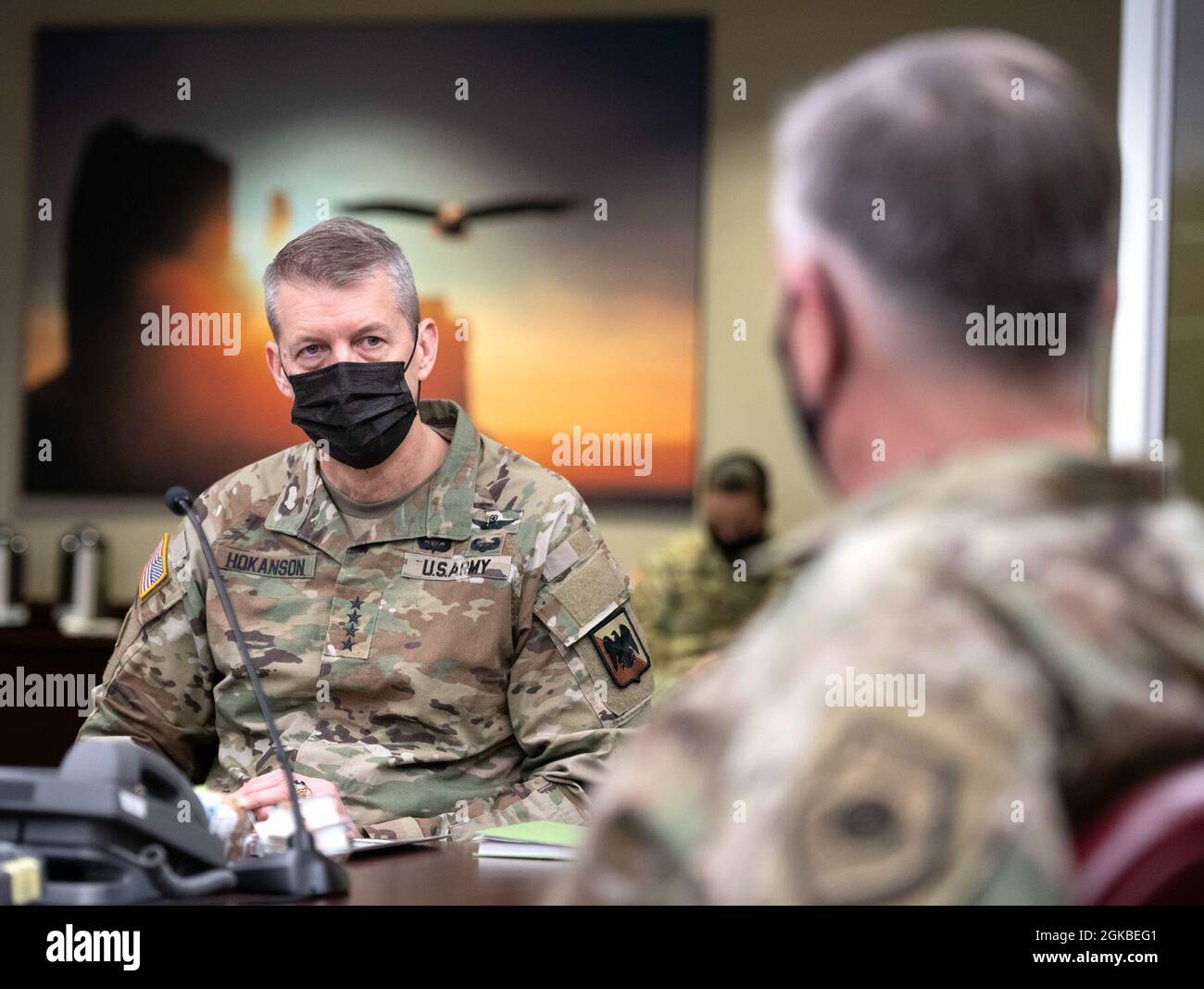 Chief of the National Guard Bureau Army Gen. Daniel R. Hokanson listens ...