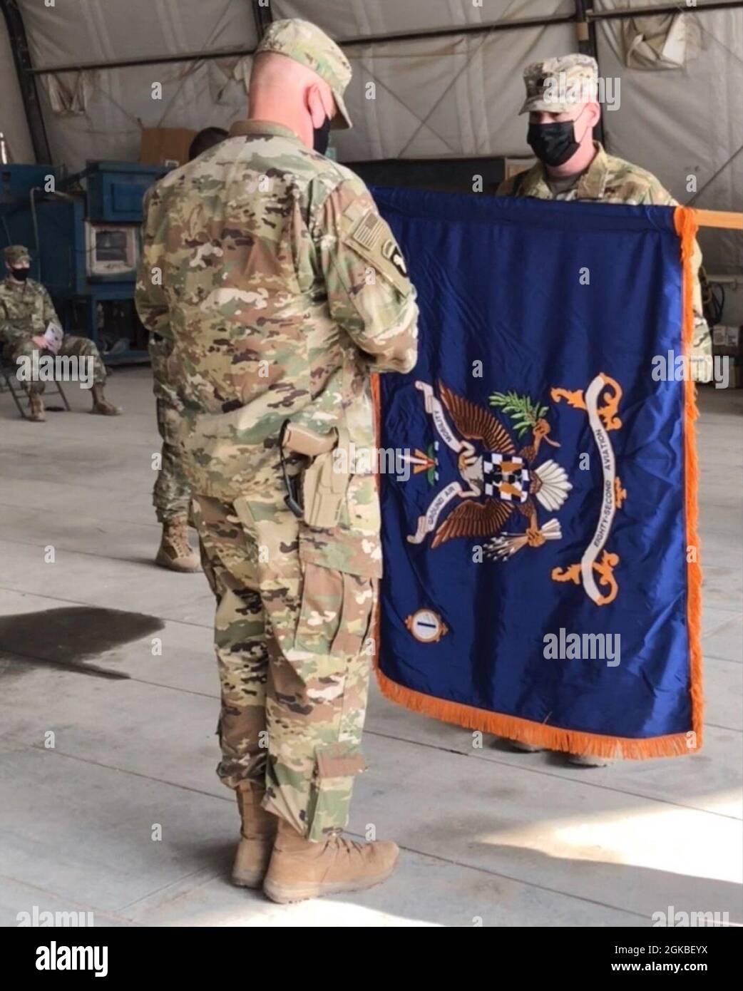 U.S. Army Command Sgt. Maj. Thomas Coveney, left, and Lt. Col. James ...
