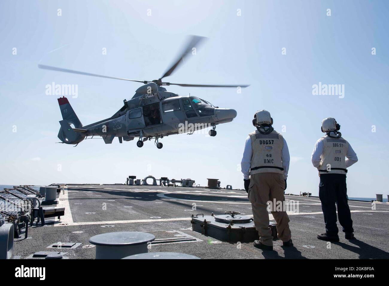 210304-N-QD512-3280 ATLANTIC OCEAN (March 4, 2021) Sailors observe a ...