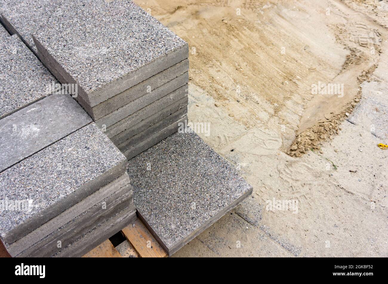 Stacked street tiles on a pallet Stock Photo - Alamy