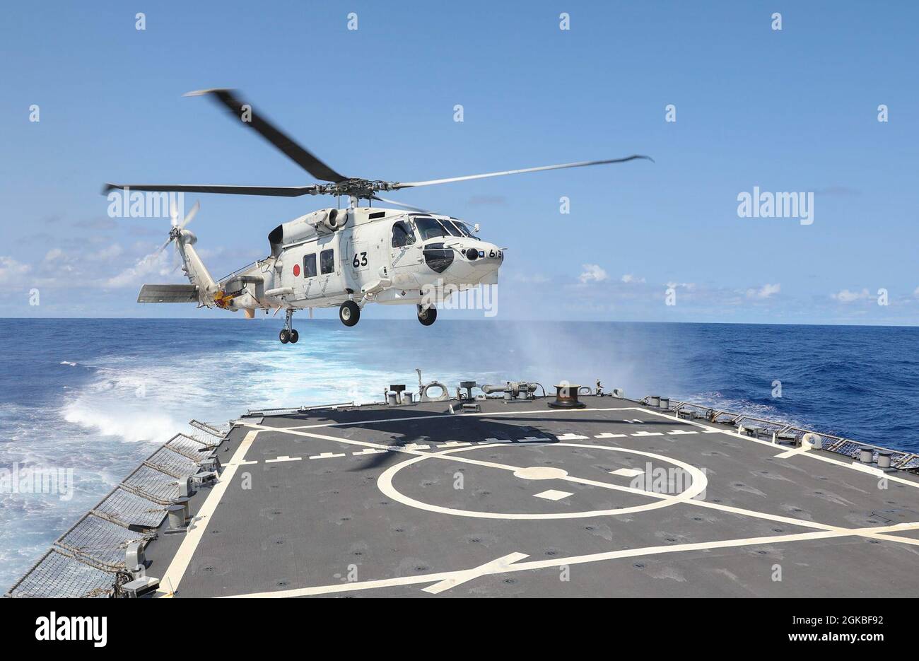 A Japan Maritime Self Defense Force SH-60 Seahawk lands on the flight ...
