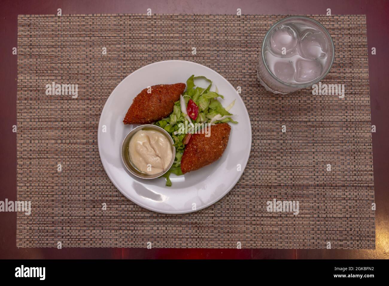 Kebbe dish, fried meat with different spices, arabic food Stock Photo ...