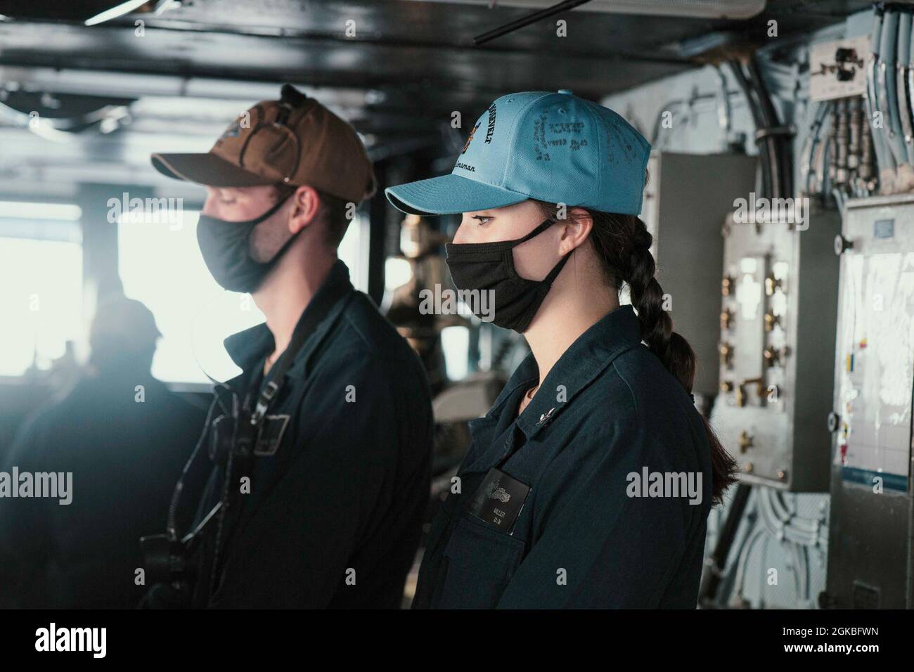 U.S. Navy Yeoman Third Class Alexandra Miller, right, from Annapolis ...