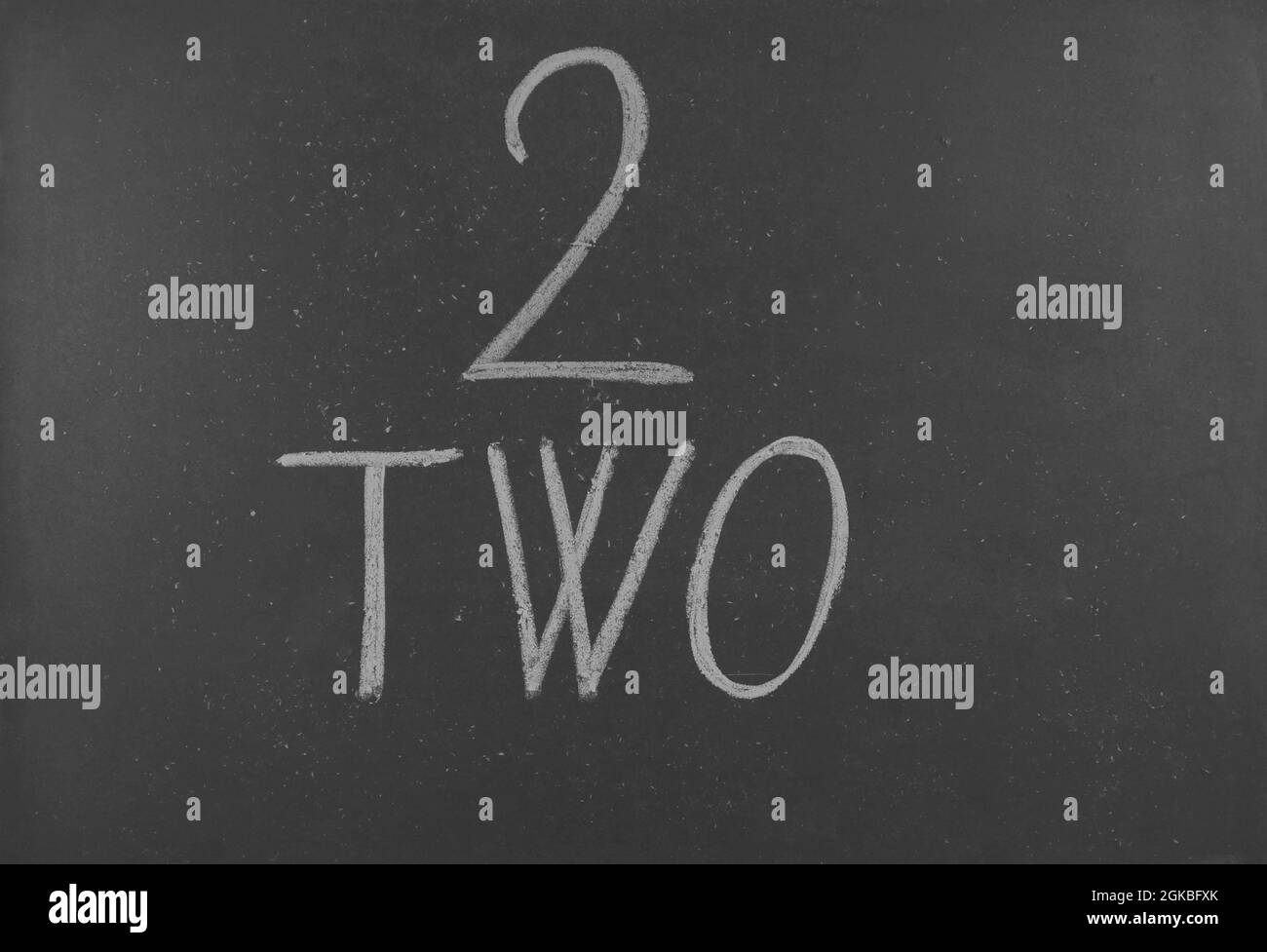 Number two written on the blackboard Stock Photo - Alamy