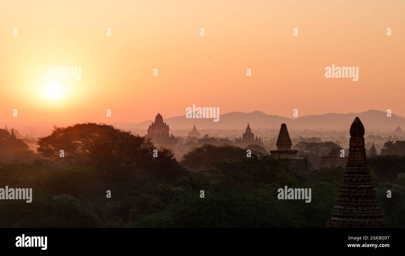 Yellow sunrise over temple hi-res stock photography and images - Alamy