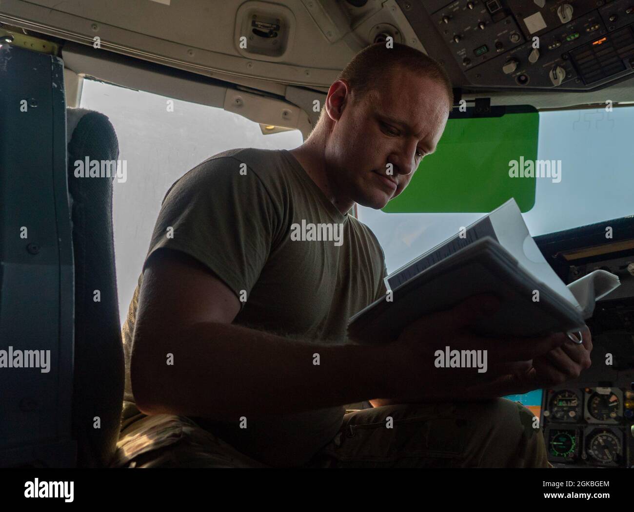 A U.S. Air Force KC-10 Extender aircraft crew member performs routine ...