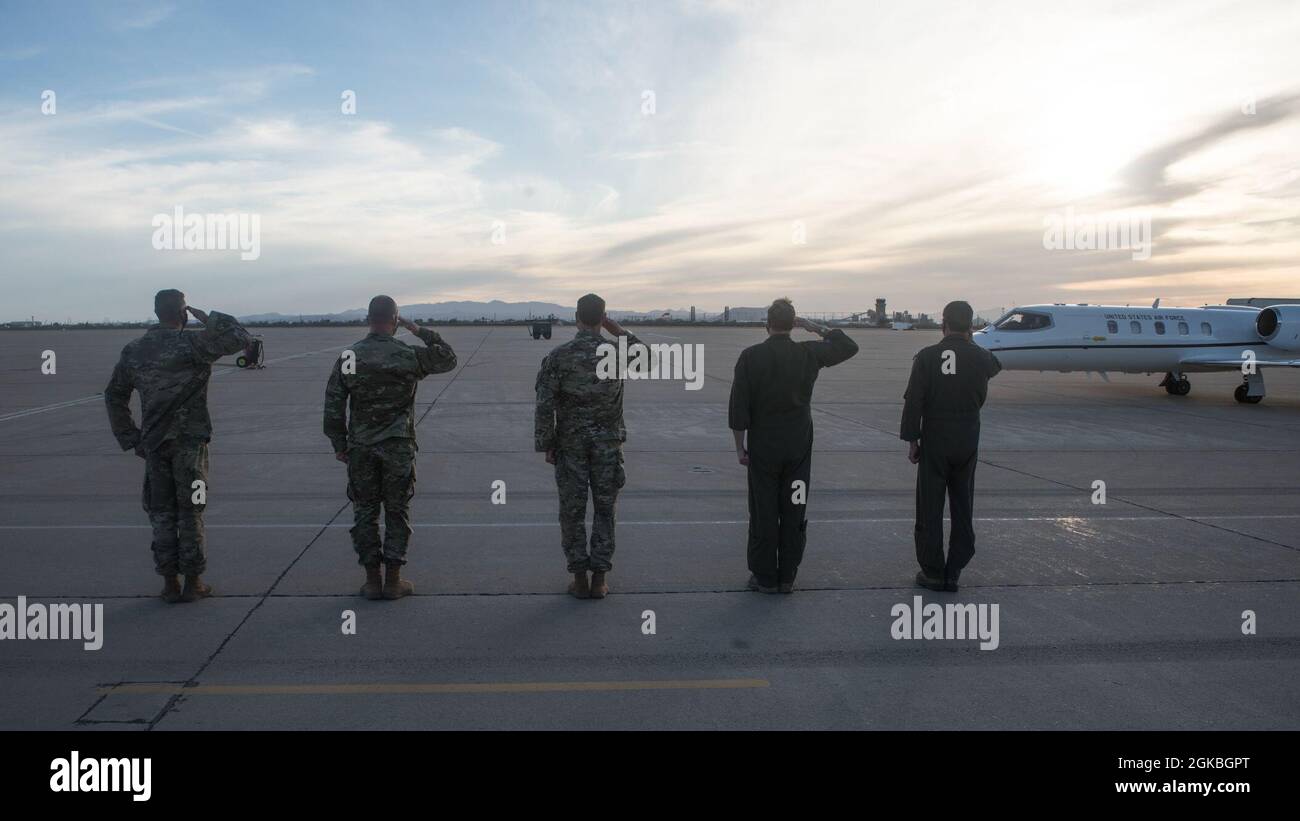 Leadership from 12th Air Force and the 355th Wing render a salute as U ...
