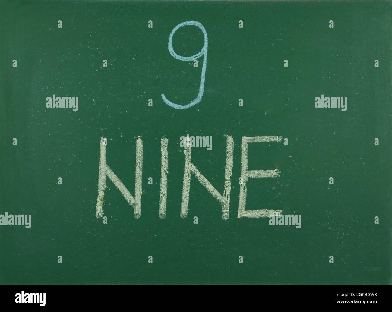 Number nine written in chalk on the school board Stock Photo - Alamy