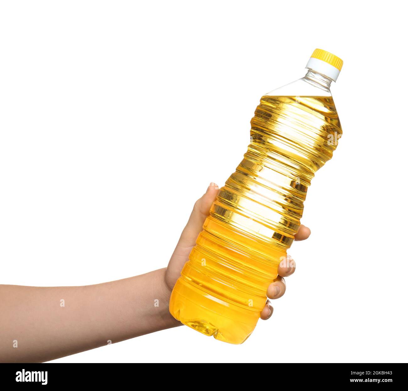 Female hand holding bottle of cooking oil on white background Stock ...