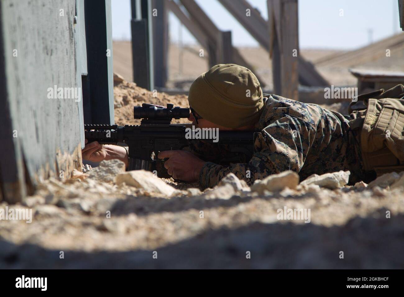 A U.S. Marine fires an M16A4 service rifle in the prone position during ...