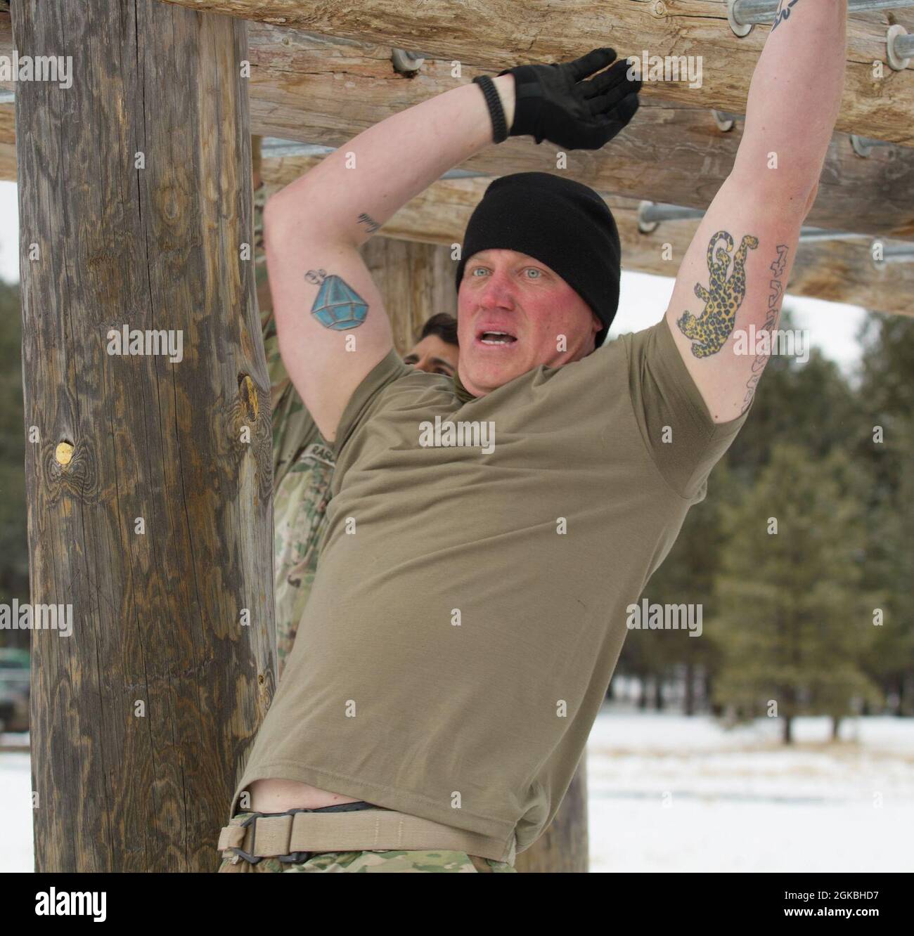 Sgt. Christopher Black of the 860th Military Police Company swings ...