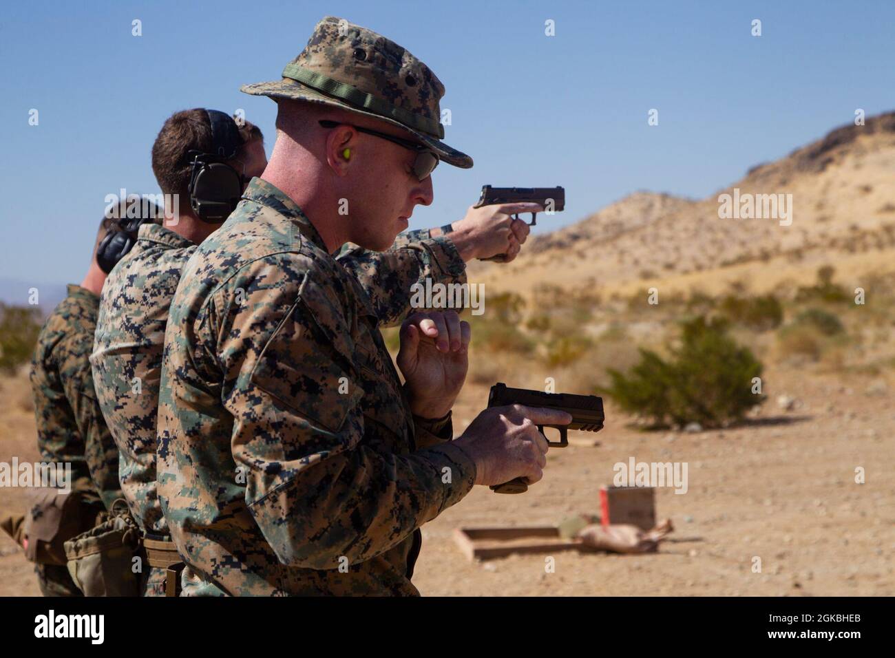 U.S. Marines participate in the pistol competition during the Marine ...