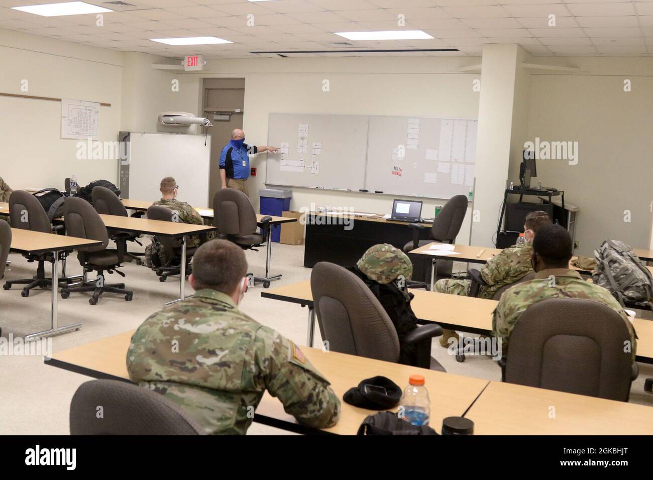 Soldiers from the 256th Field Hospital review the layout for a 32-bed ...