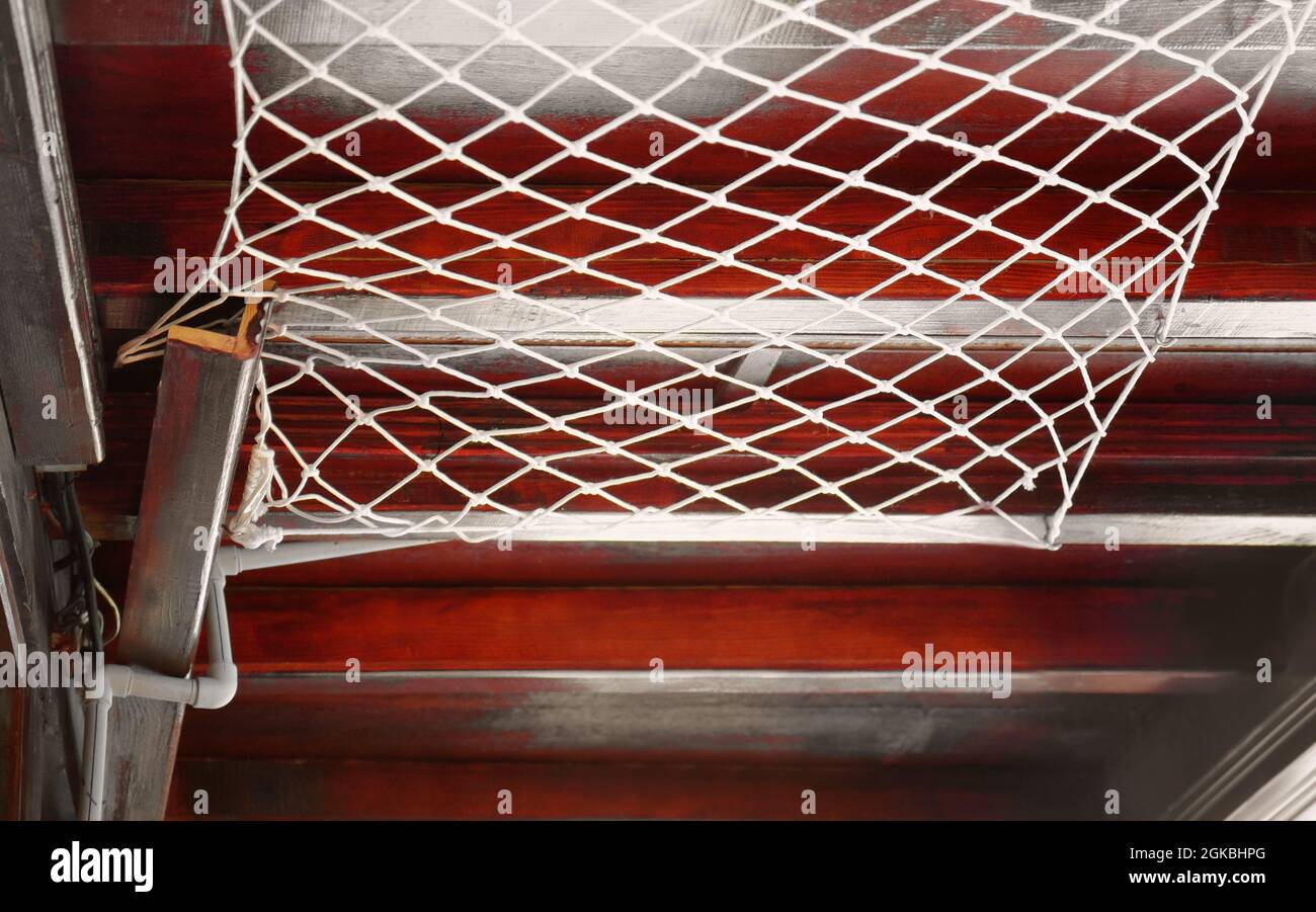 Net under roof of boat Stock Photo - Alamy