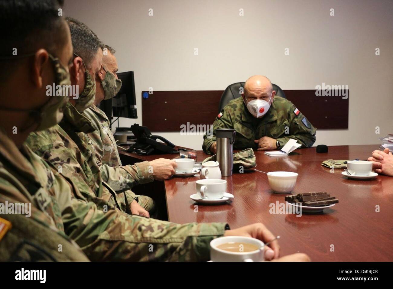 Polish army Col. Wojciech Grzybowski (right), 24th Garrison Support ...