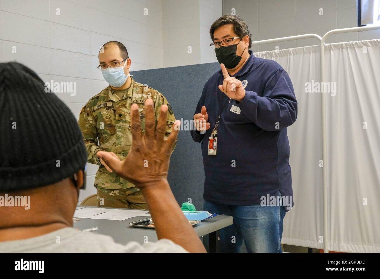 U.S. Army Spc. Zachary Burton, a practical nursing specialist assigned ...