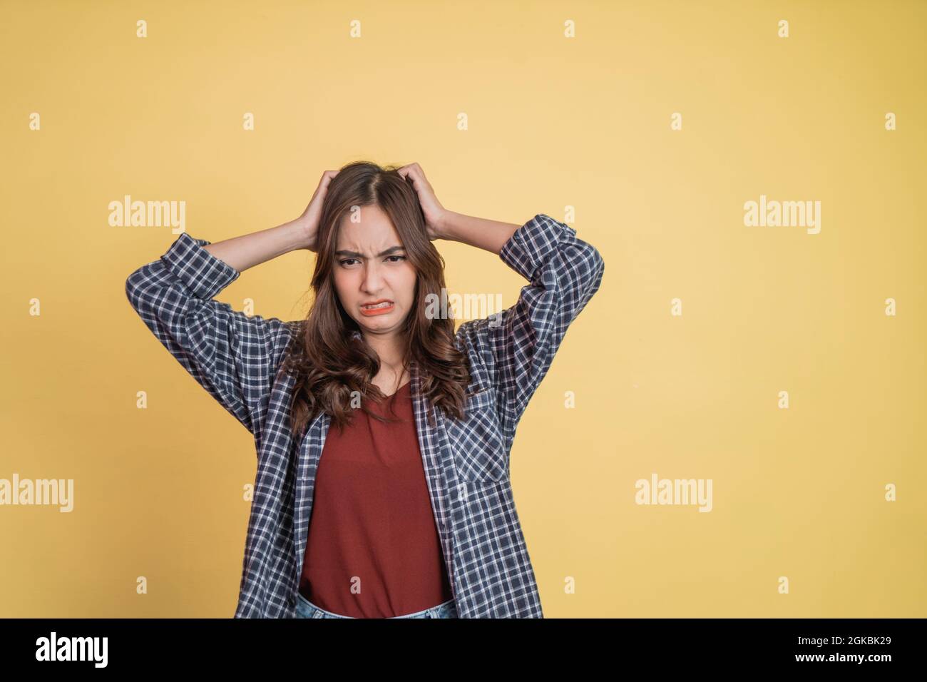 Woman holding face dizzy hi-res stock photography and images - Alamy