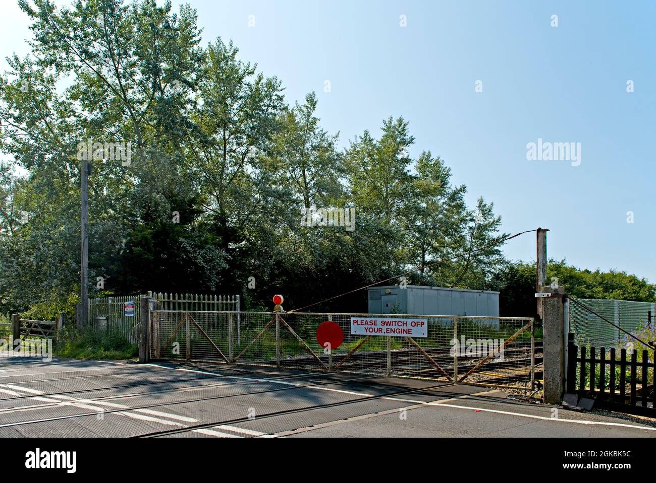 Traditional gated rail crossing hi-res stock photography and images - Alamy