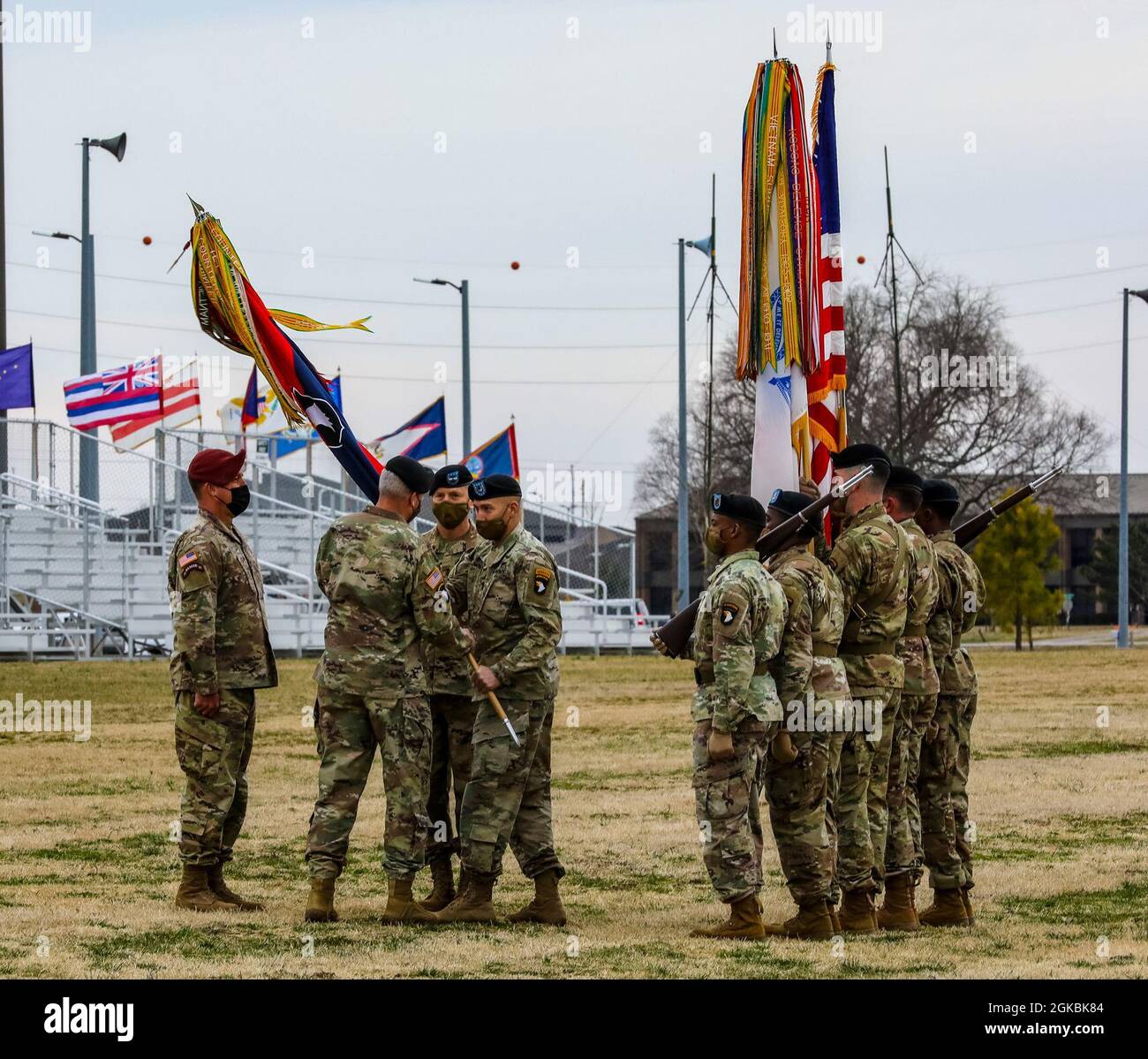 Command Sgt. Maj. Bryan Barker, the division Sgt. Maj. passes the ...