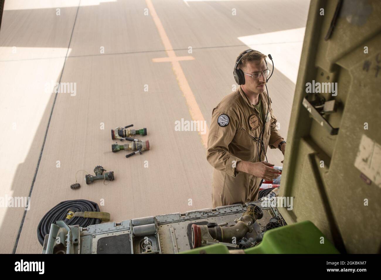 A U.S. Marine with Marine Aerial Refueler Transport Squadron 352 (VMGR ...