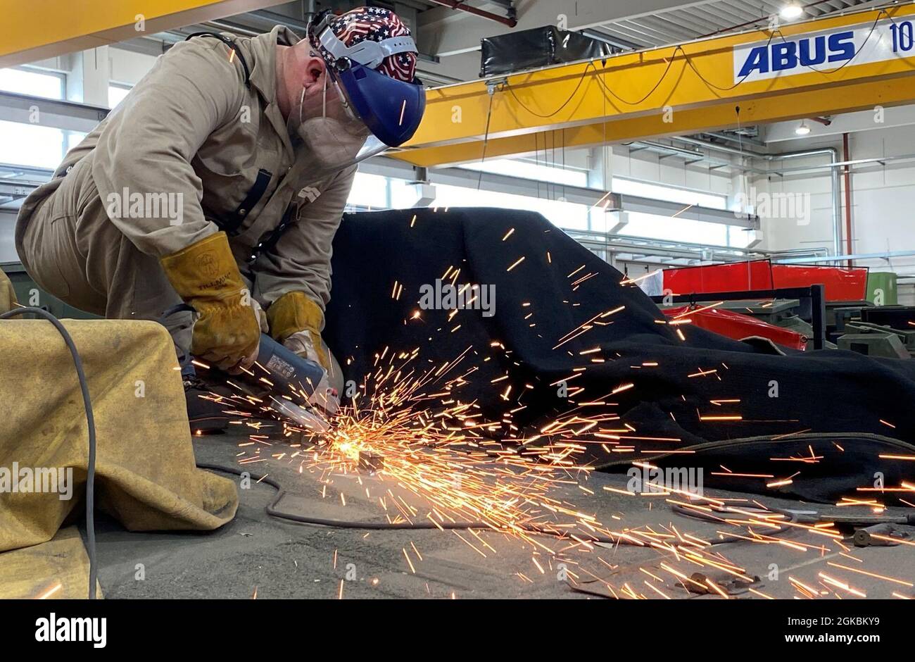 A contractor at Coleman worksite’s Army Prepositioned Stock-2 makes a ...