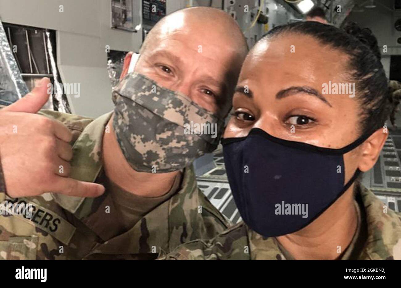 Army Lt. Col. (Dr.) Alicia Williams (right) poses with Air Force Capt ...