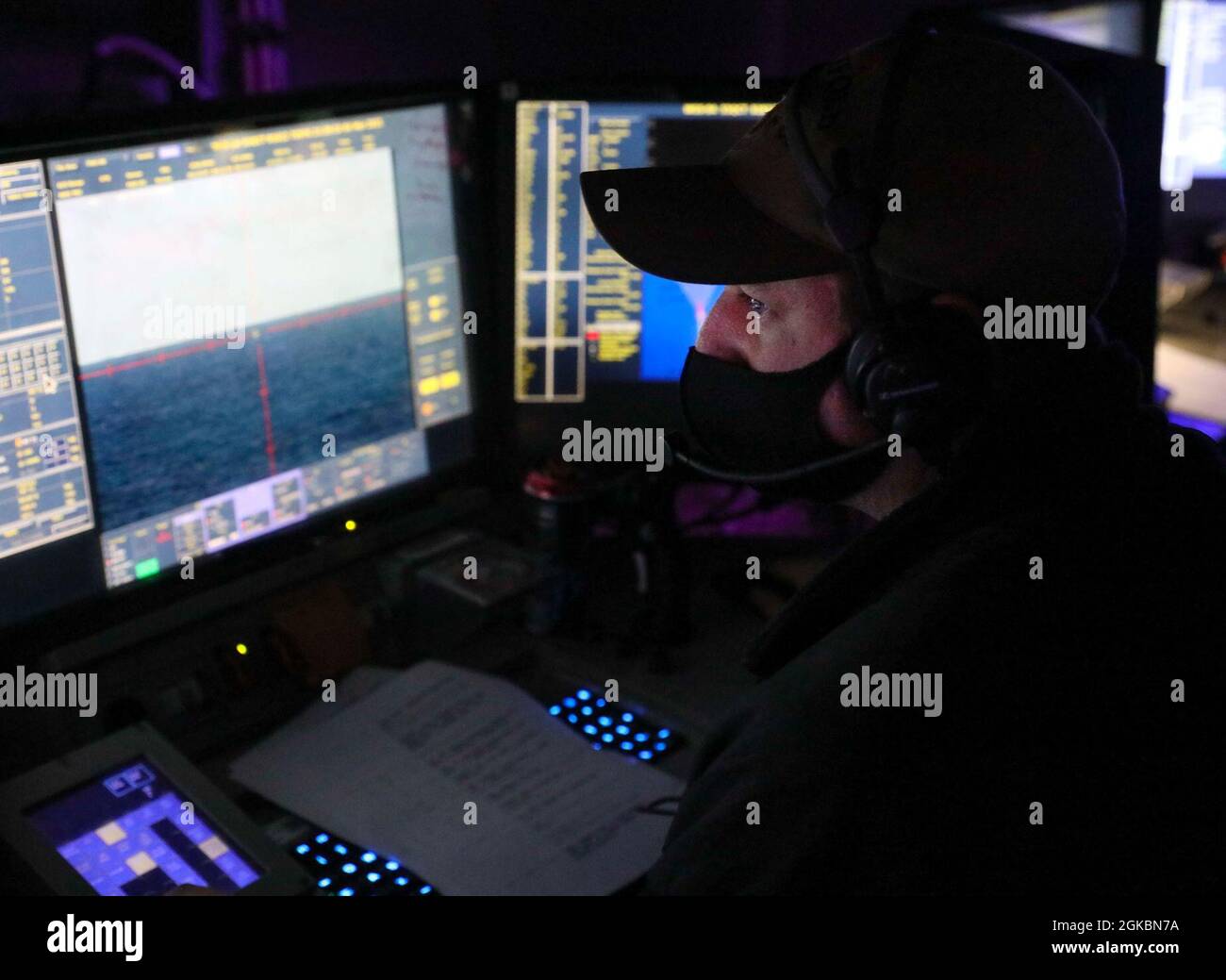 Fire Controlman 1st Class Michael Fraine, from Cheyenne, Wyo., operates ...