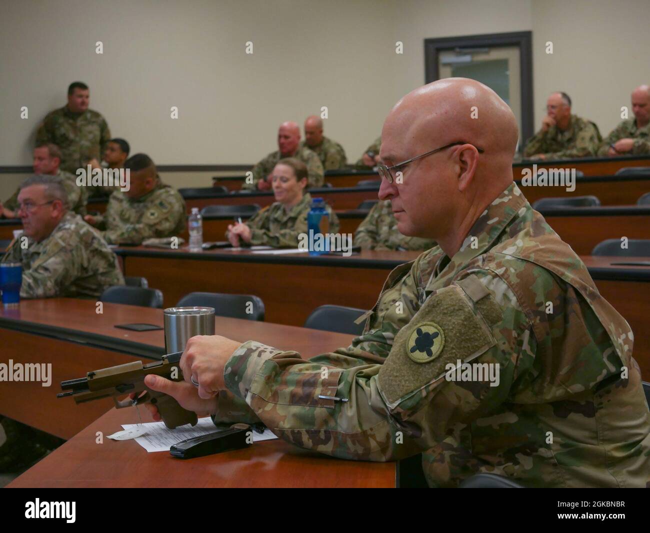 Col. Hugh McCallum, 184th Sustainment Command, inspecting the M17 ...