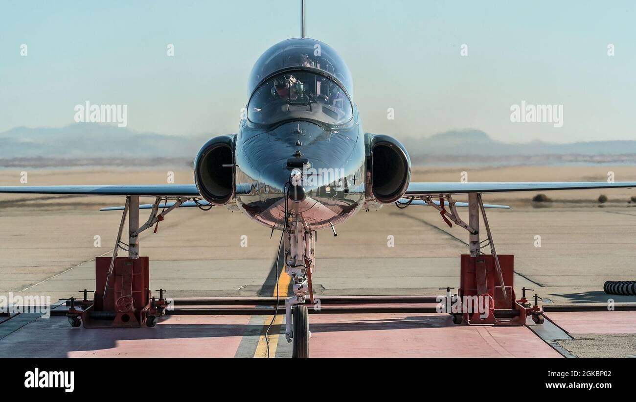 An Air Force Test Pilot School student prepares to conduct a data ...