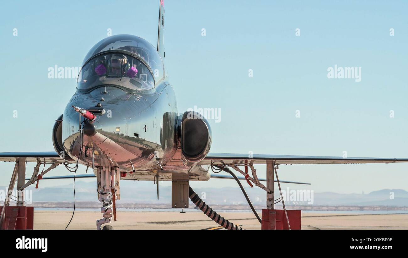 An Air Force Test Pilot School student conducts a data collection test ...