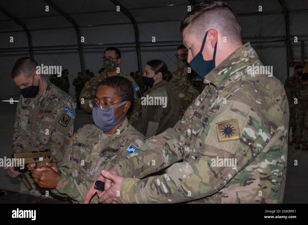 Sgt. Abraham Boxx, a critical care flight paramedic, teaches Pfc ...