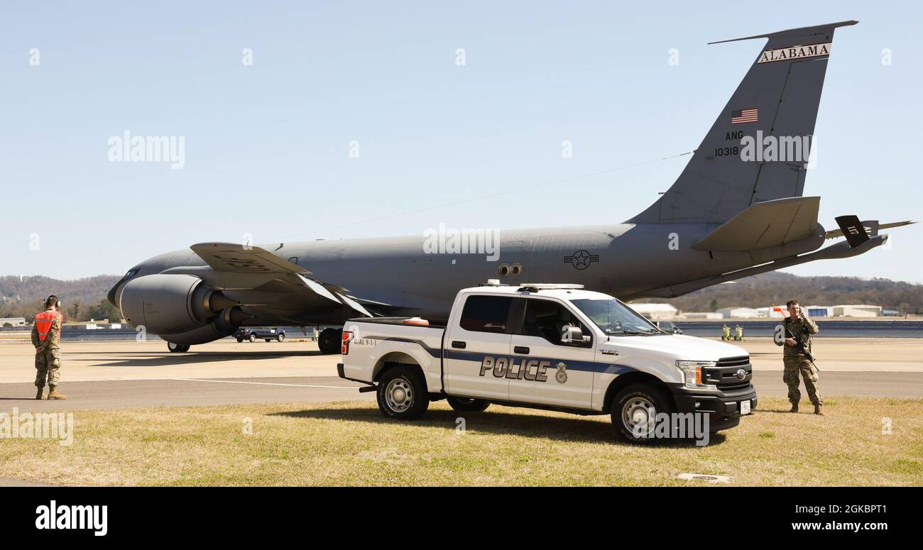 A 117th Security Forces Squadron member provides security for a KC-135R ...