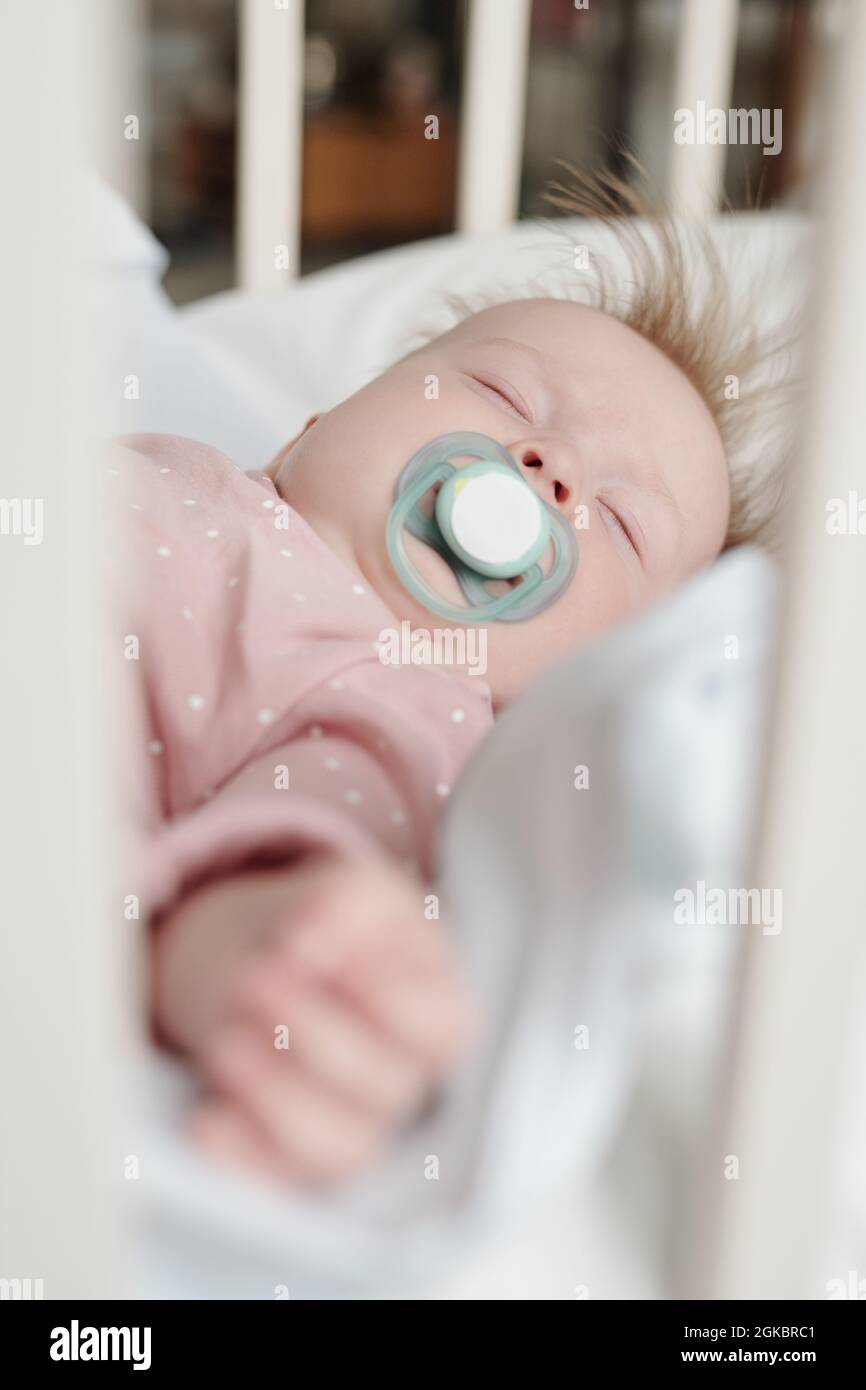 Child asleep with pacifier hi-res stock photography and images - Alamy