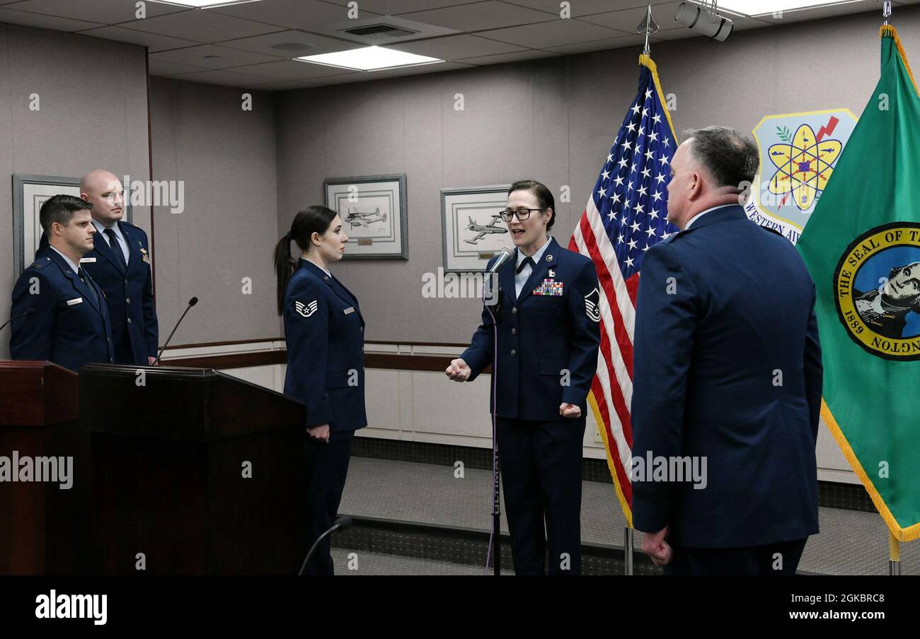 Washington Air National Guard Master Sgt. Tracey Thurston (center ...