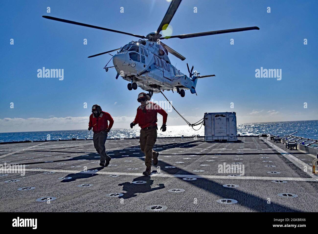 Civil service mariner crew members onboard the Military Sealift Command dry cargo/ammunition ...