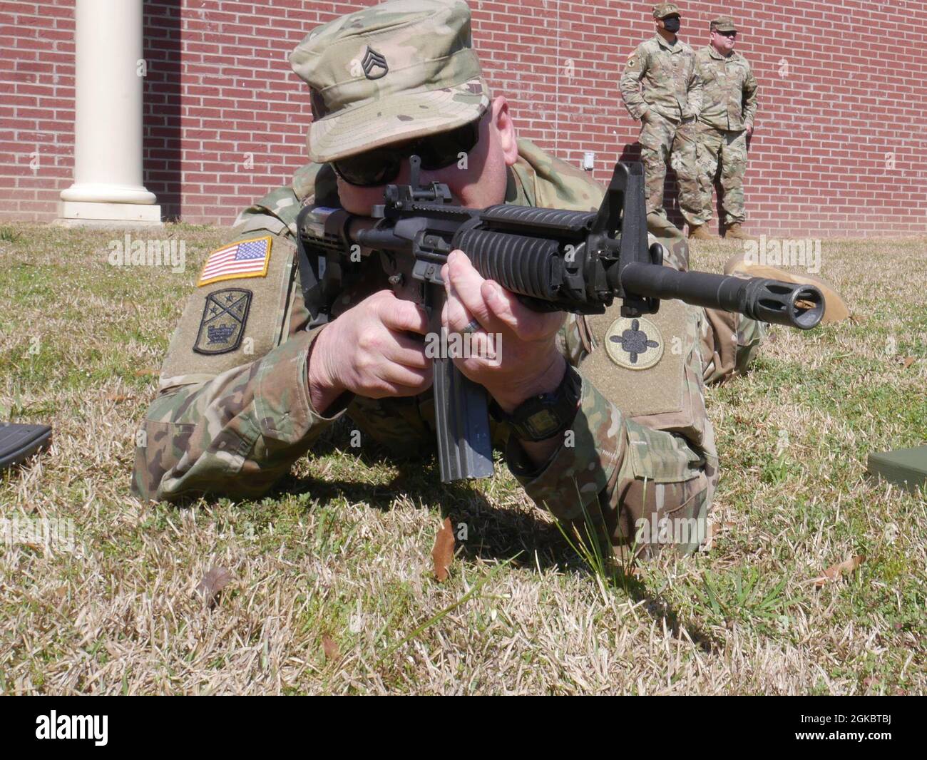 Staff Sgt. Kevin Waters, 184th Sustainment Command, handle the M4 ...