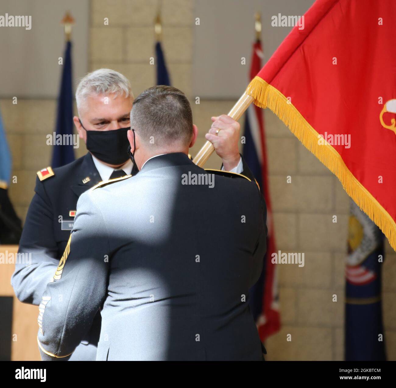 Col. Thomas Wargo passes the colors to Col. Roger Wold during the 205th ...